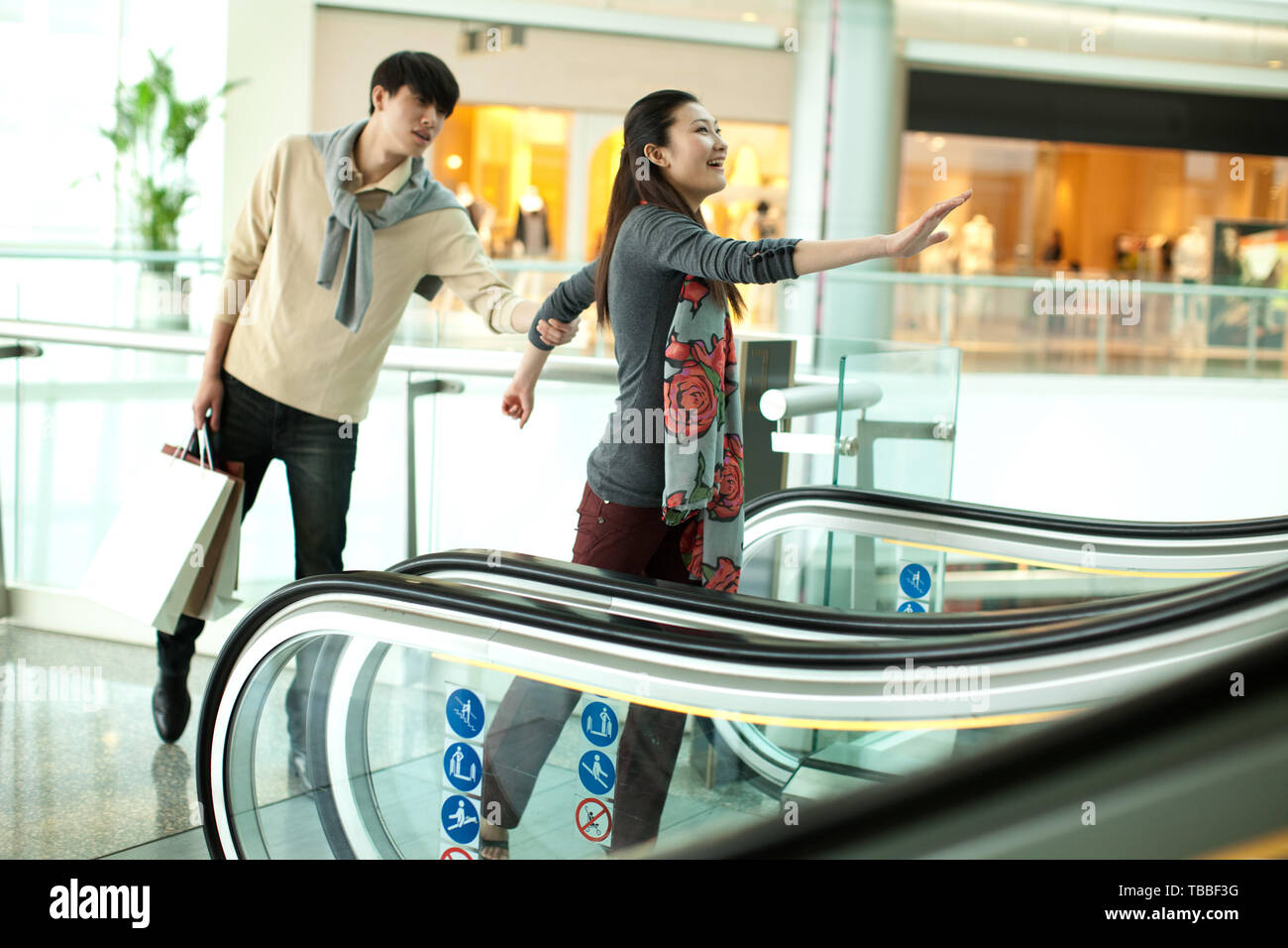 A couple went shopping at the mall Stock Photo - Alamy