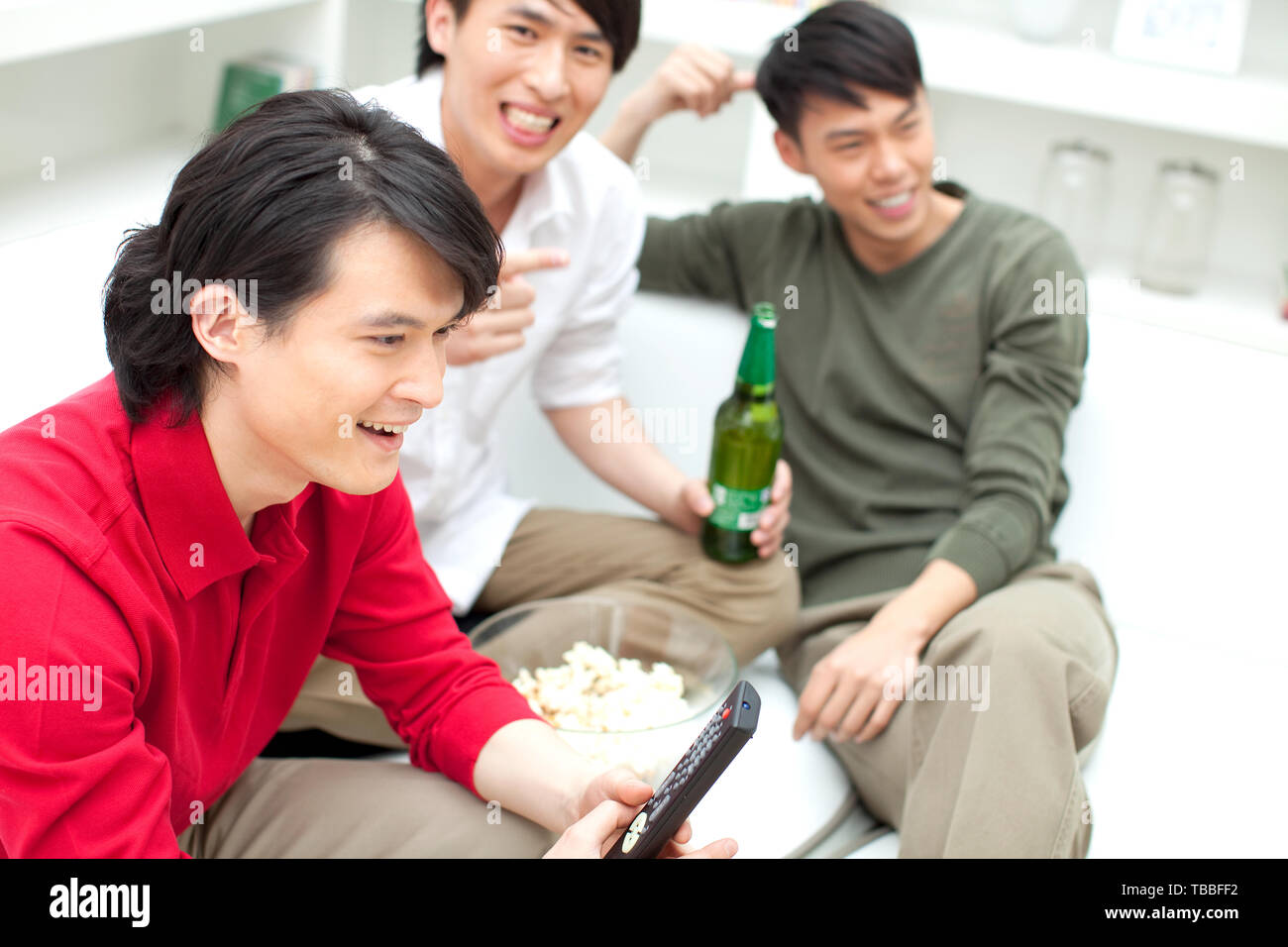 A party of three men Stock Photo - Alamy