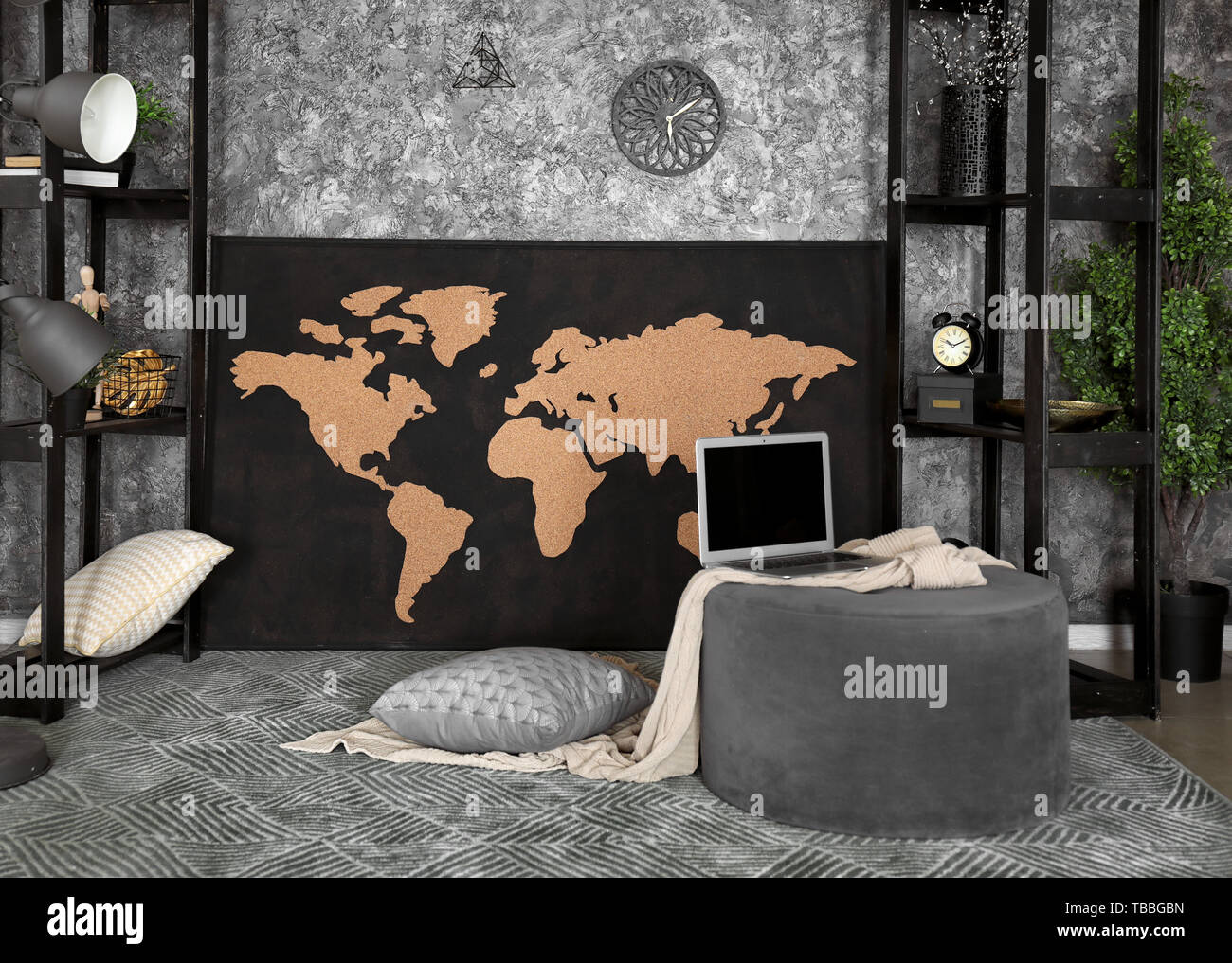 Interior of modern room with picture of world map near wall Stock Photo ...