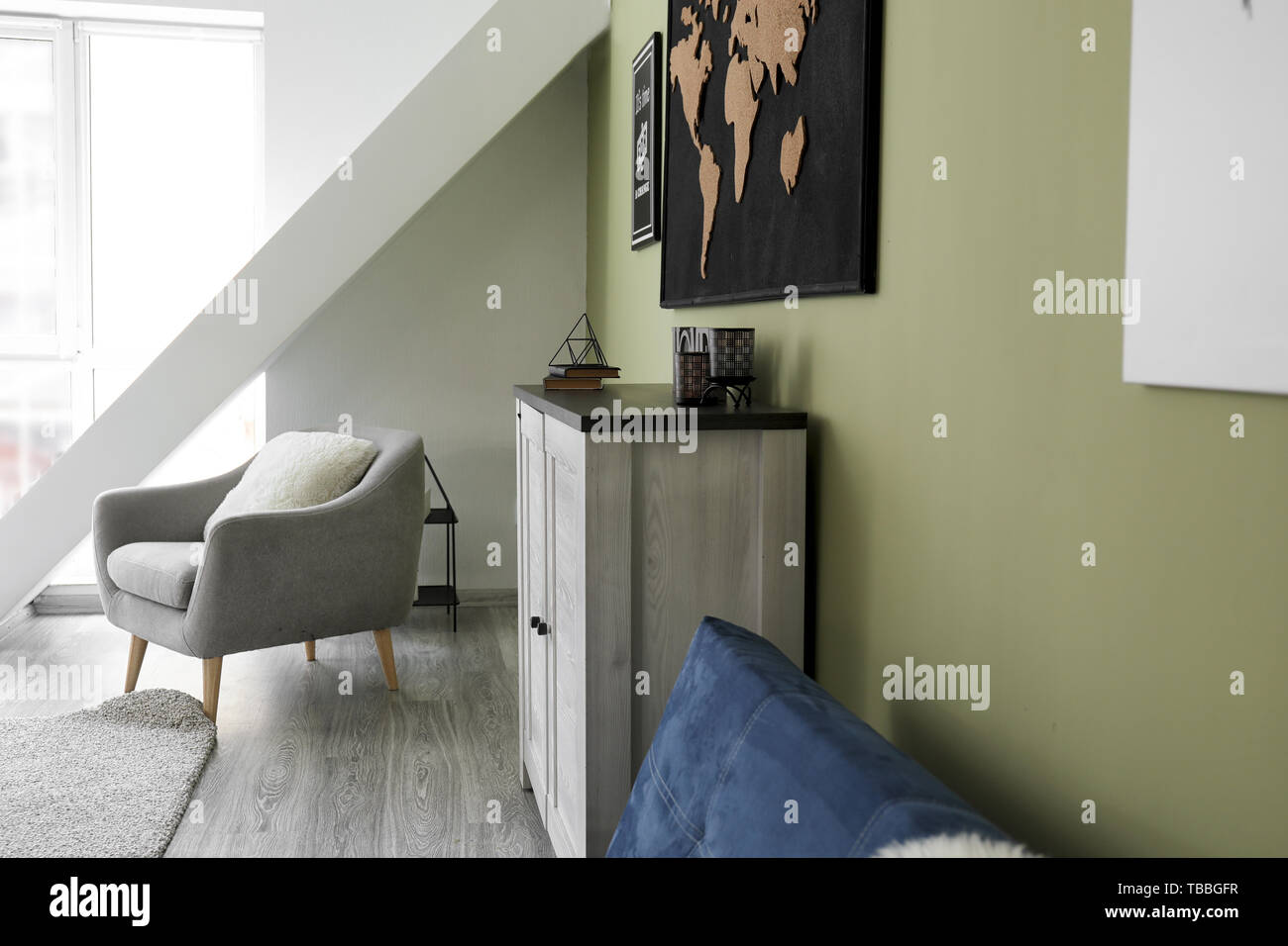 Interior of modern room with picture of world map on wall Stock Photo ...