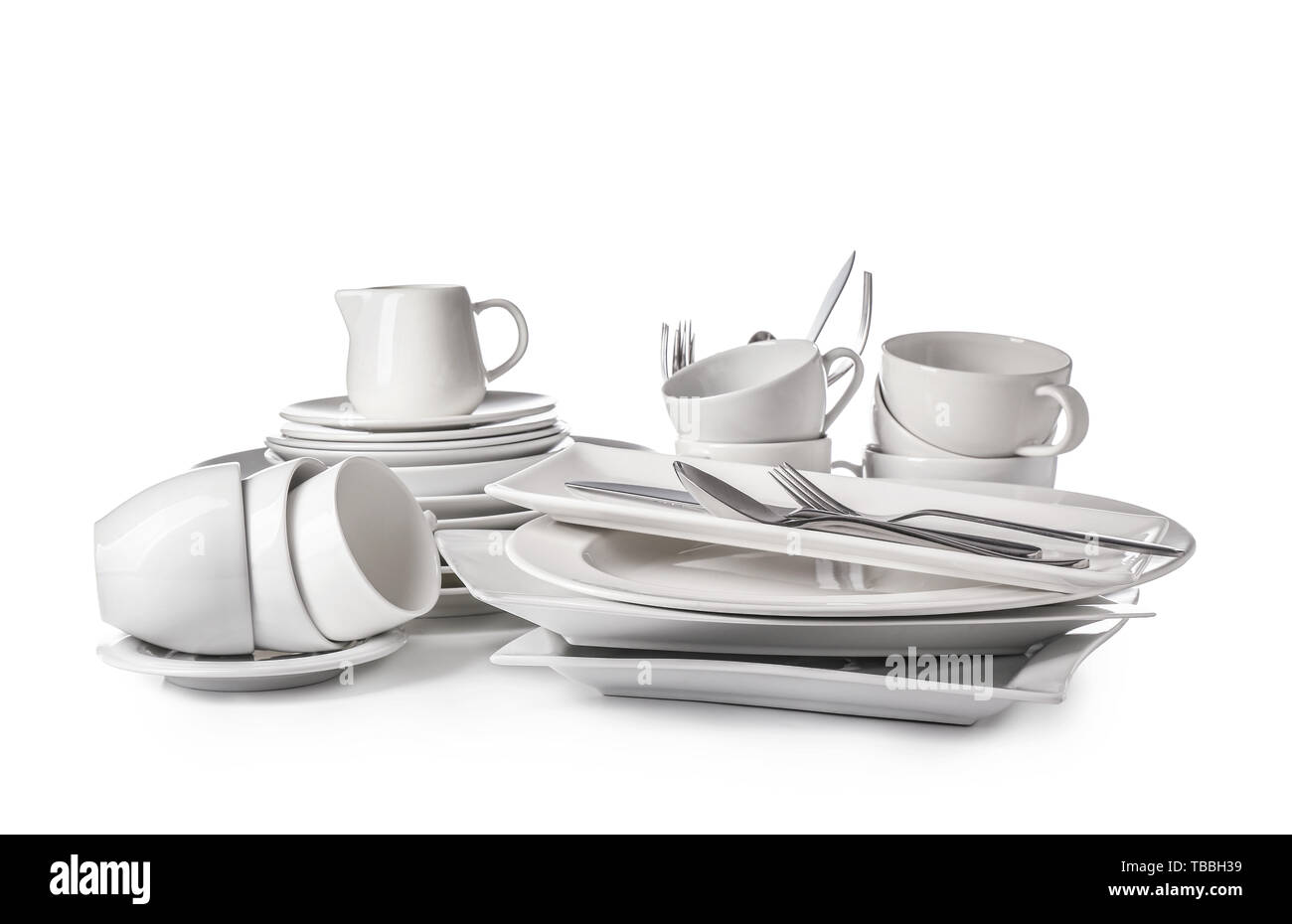 Set of clean dishes on white background Stock Photo - Alamy