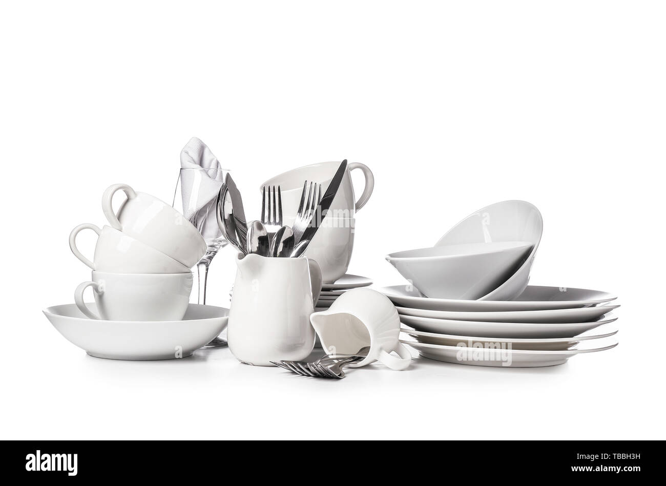 Set of clean dishes on white background Stock Photo - Alamy