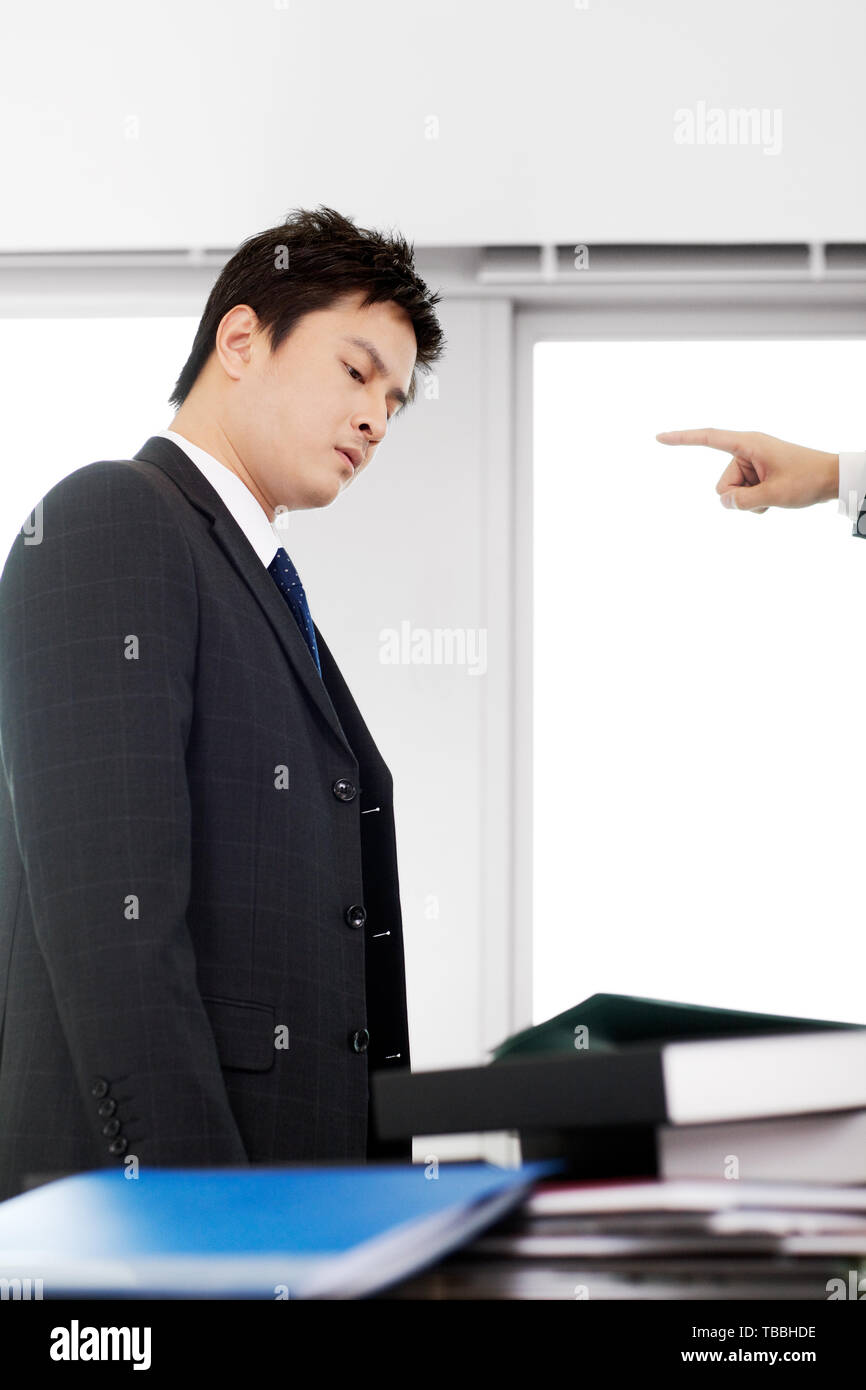 The look on a business person's face when they're scolded Stock Photo ...