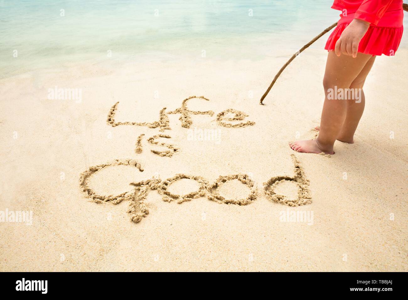 Child writing sand hi-res stock photography and images - Alamy