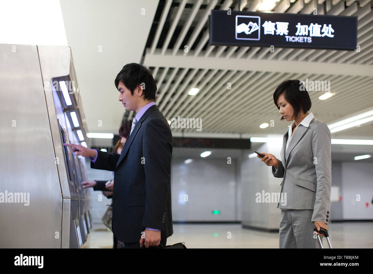 Business people take the subway on their commute to and from work Stock ...
