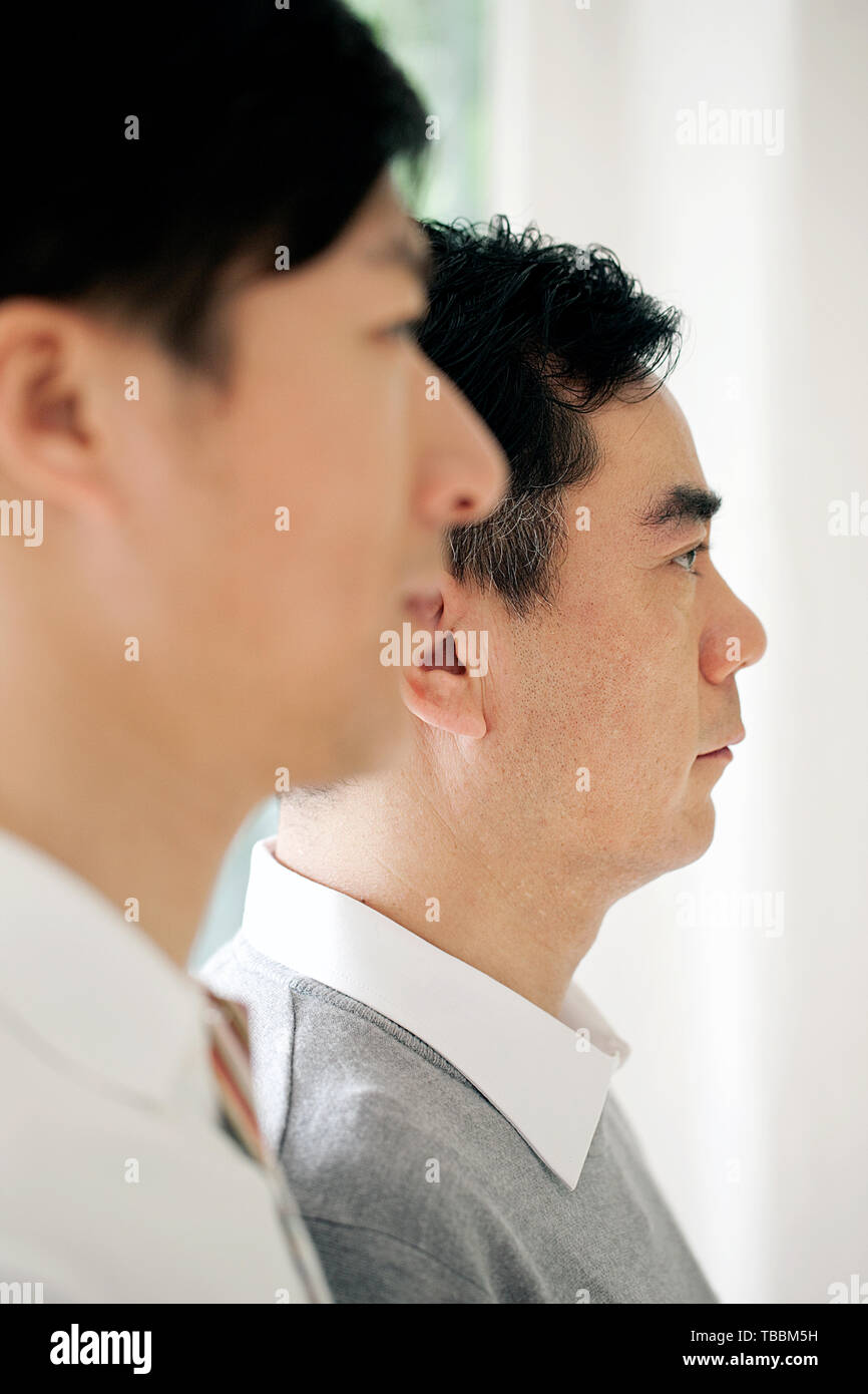 A portrait of a father and son Stock Photo - Alamy