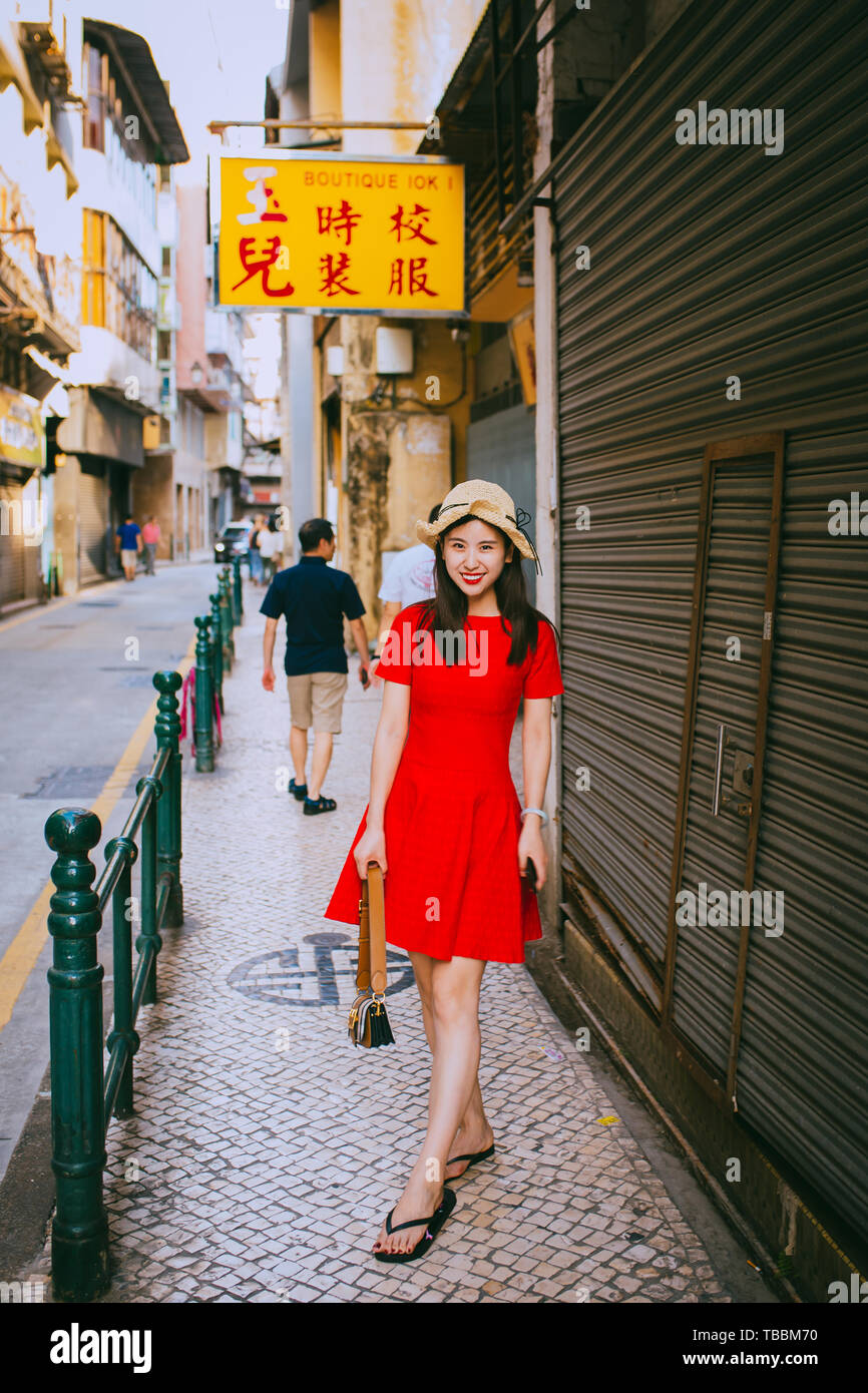 Red dress to Macau Stock Photo - Alamy