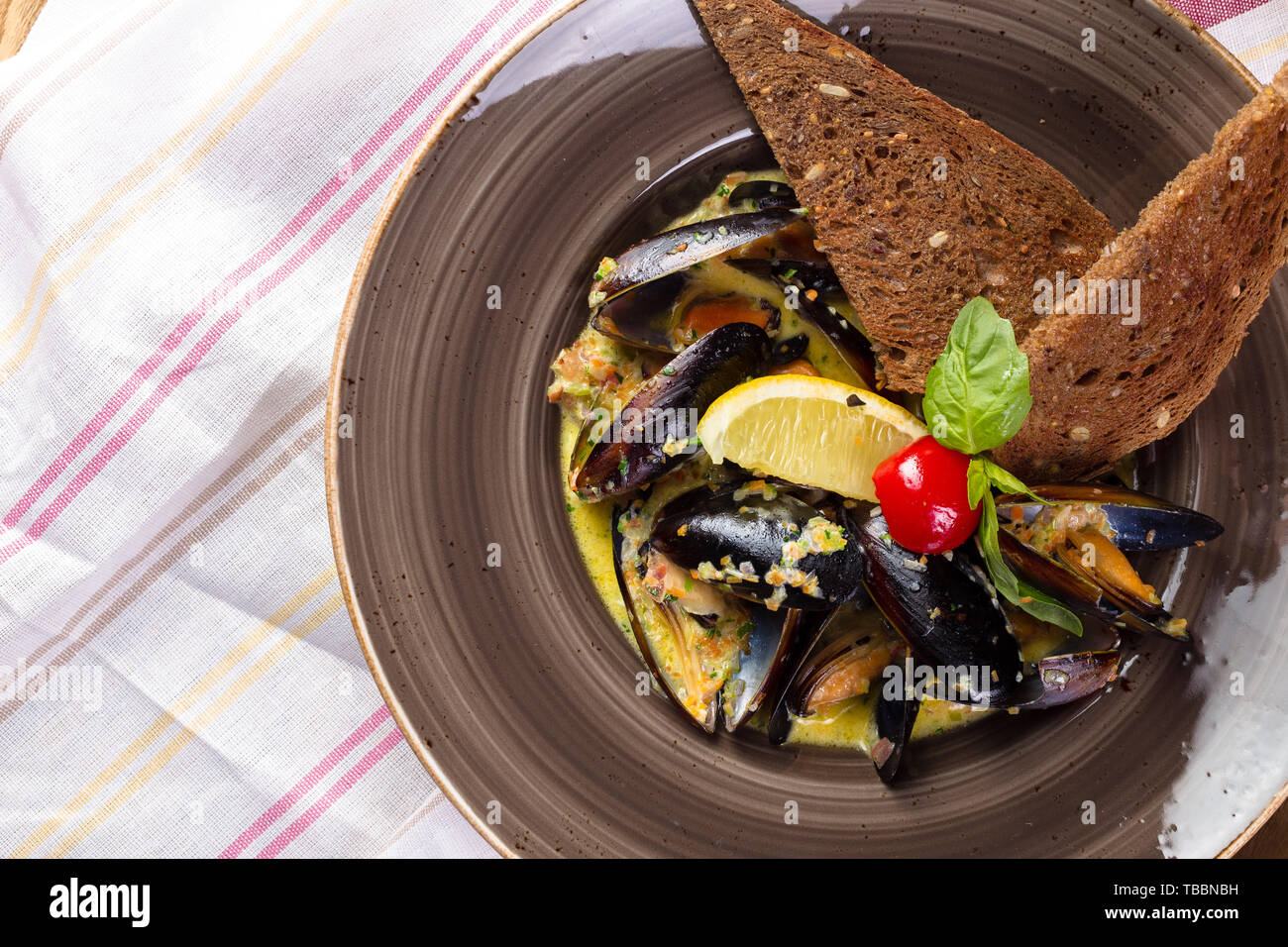 Turkish Delicious Rice Stuffed Mussels serving with tomato Stock Photo ...