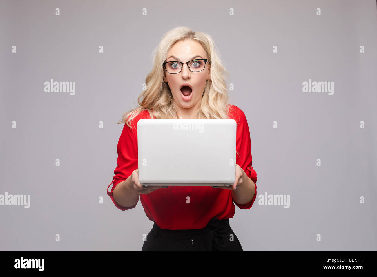 Surprised shocked blonde business woman hi-res stock photography and ...