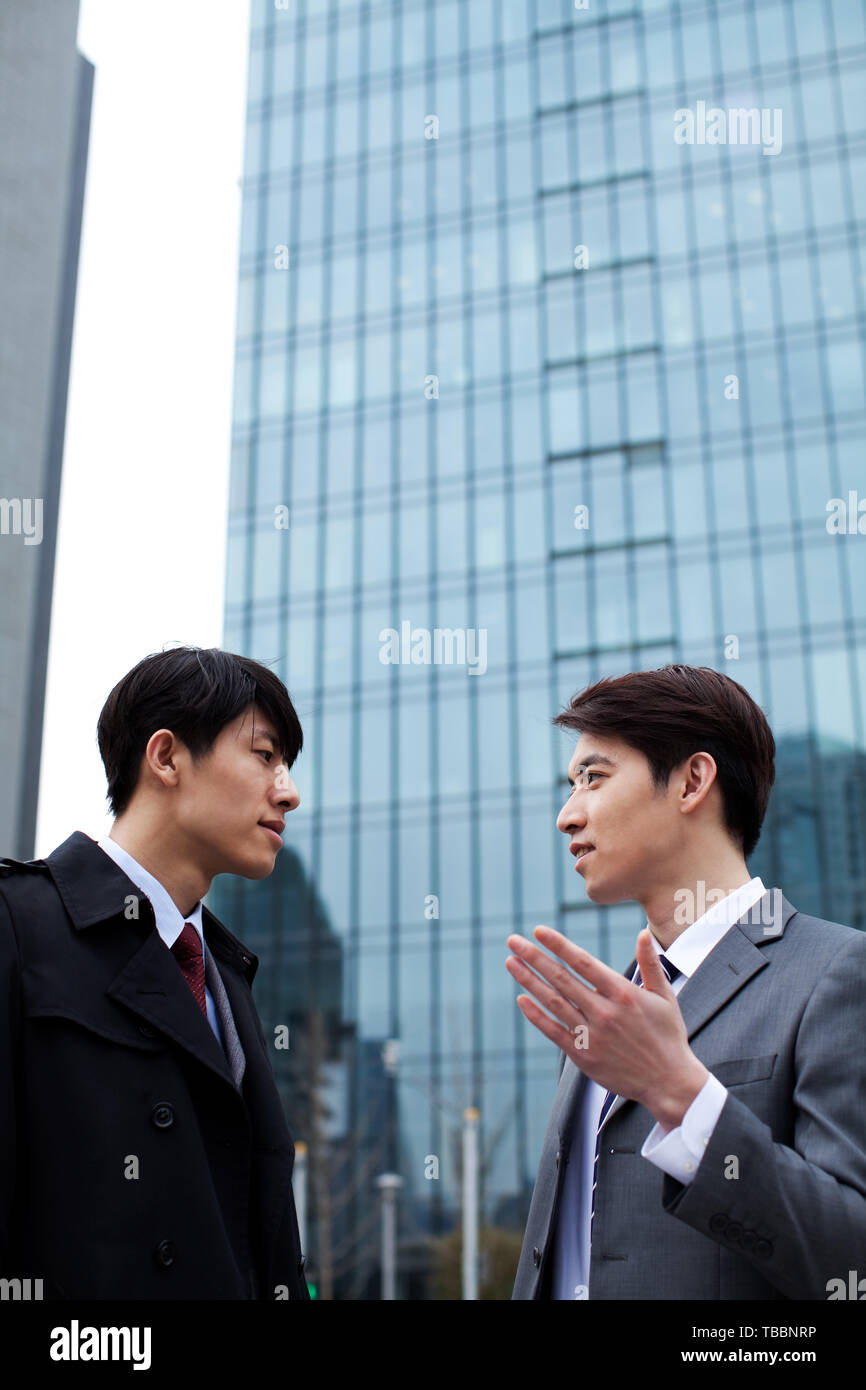Business white-collar workers in front of the office building Stock ...