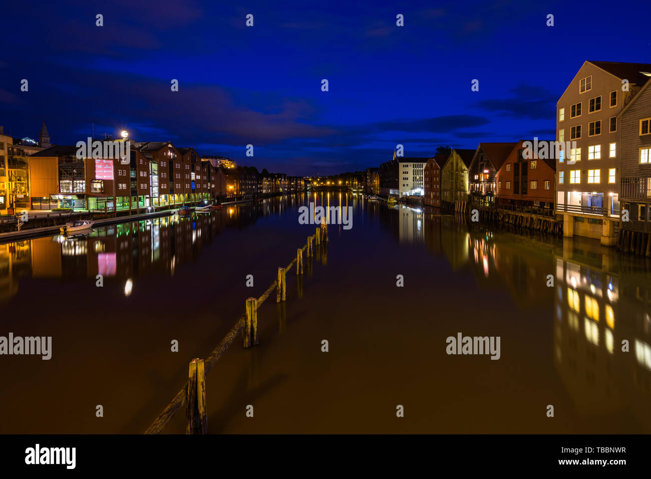 Trondheim night cityscape seen from Bakke Bru bridge with colorful ...