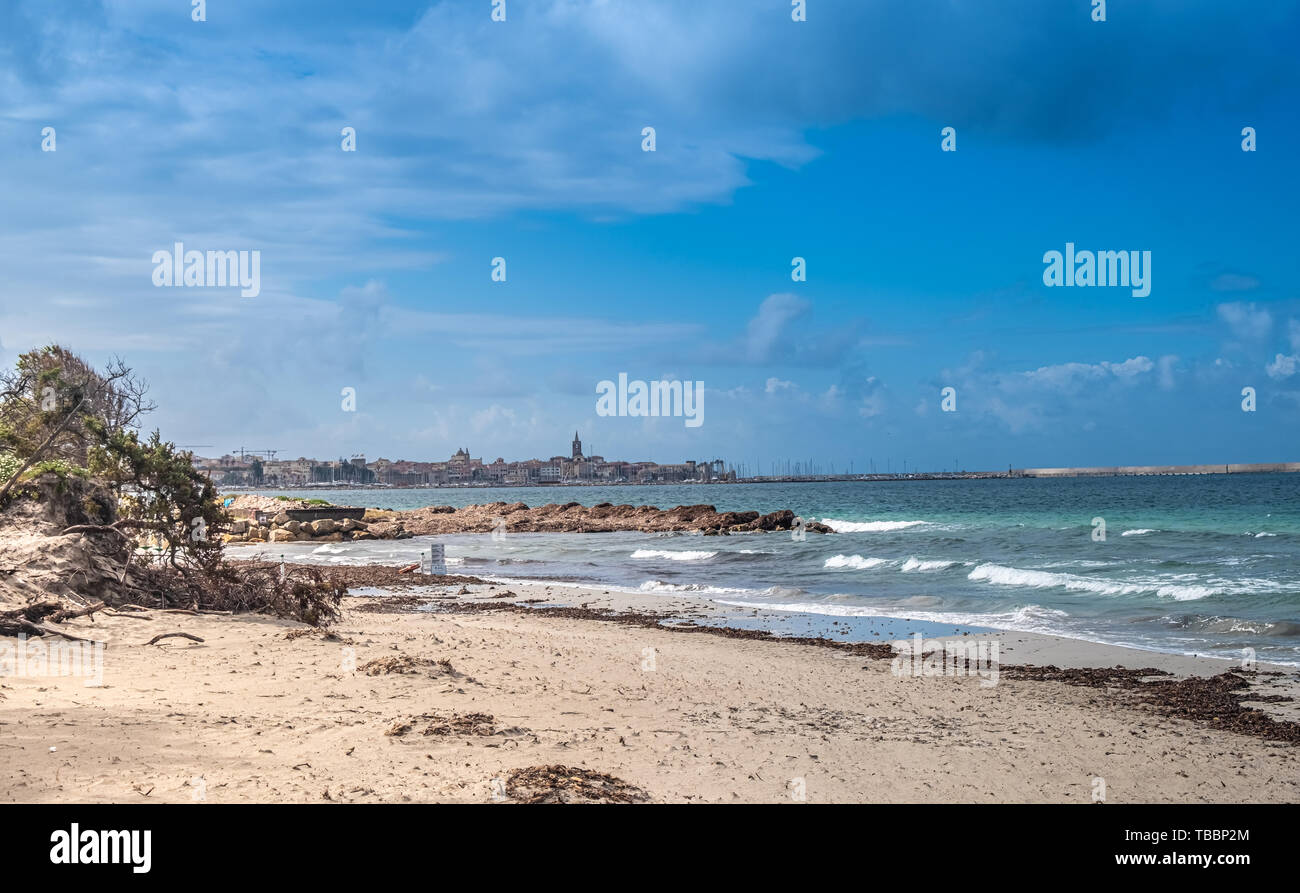Beaches of Alghero (L'Alguer) on a stormy day, province of Sassari ...