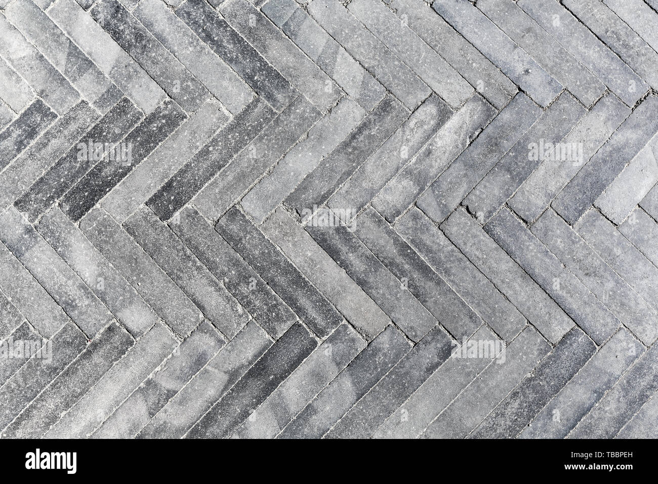 Grey brick pavement texture material Stock Photo - Alamy