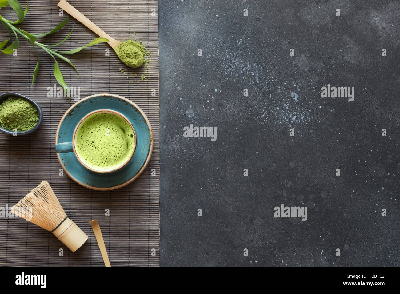 Still life with Japanese matcha green tea with accessories on black ...