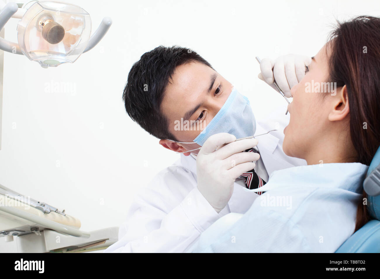 Oral examination in the clinic Stock Photo - Alamy