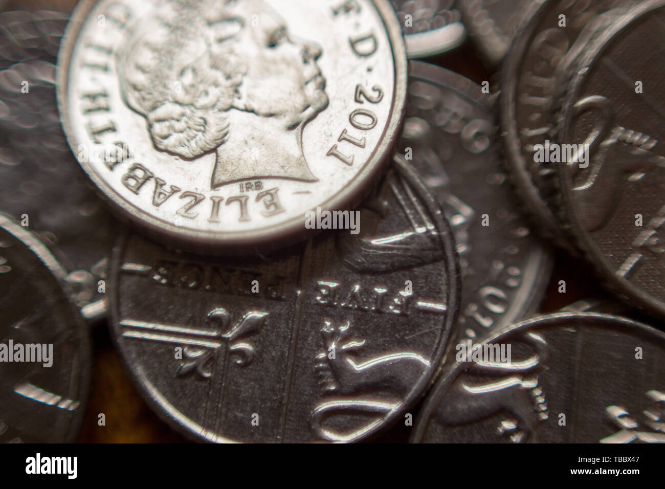 Pile of British 5 pence coins Stock Photo - Alamy