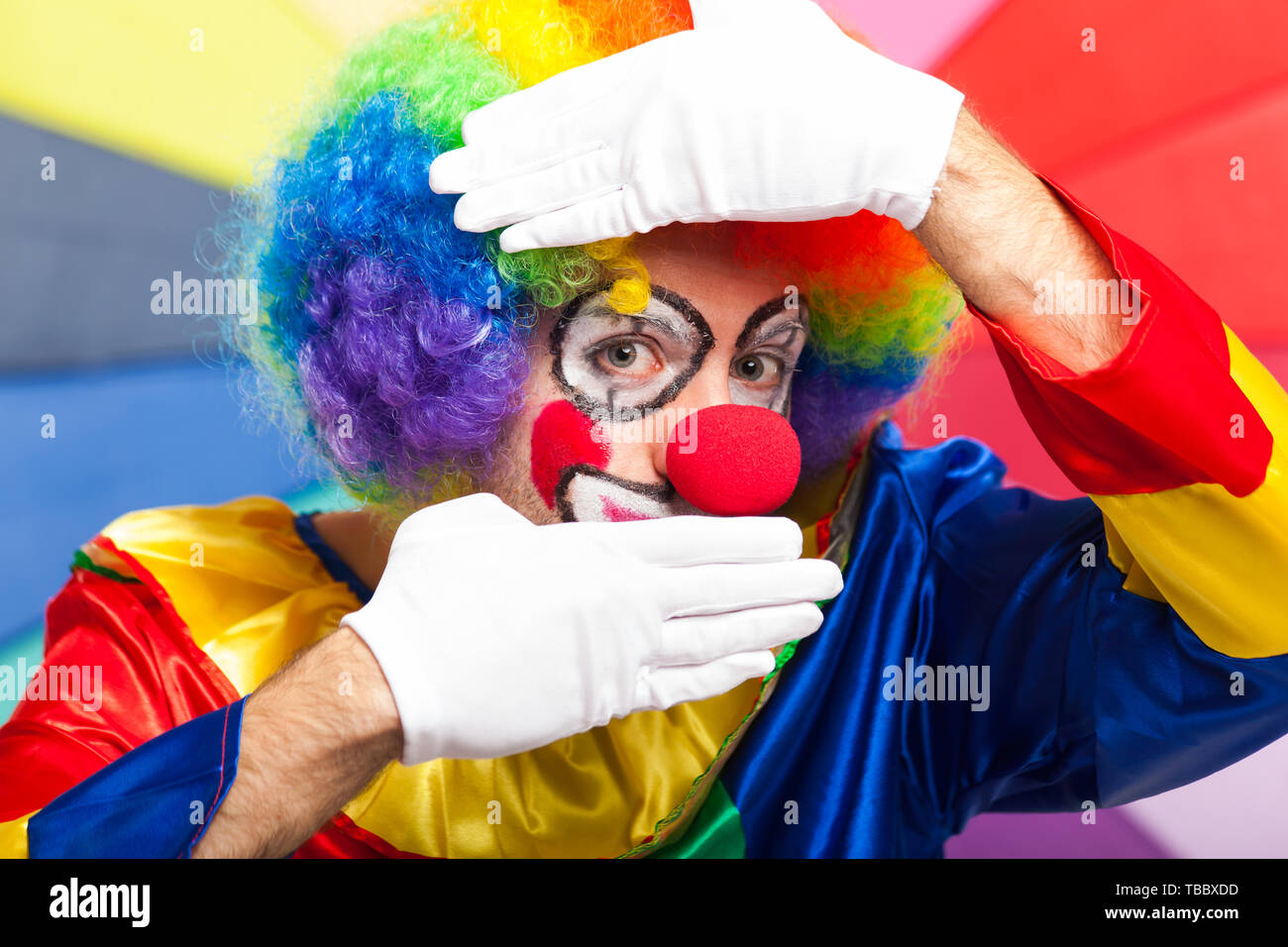 Colorful clown face Stock Photo - Alamy