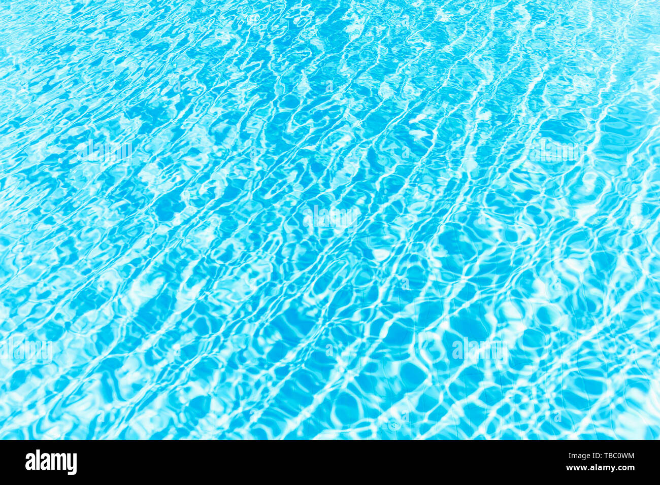 Surface of blue shining swimming pool water ripple. Can be used as ...