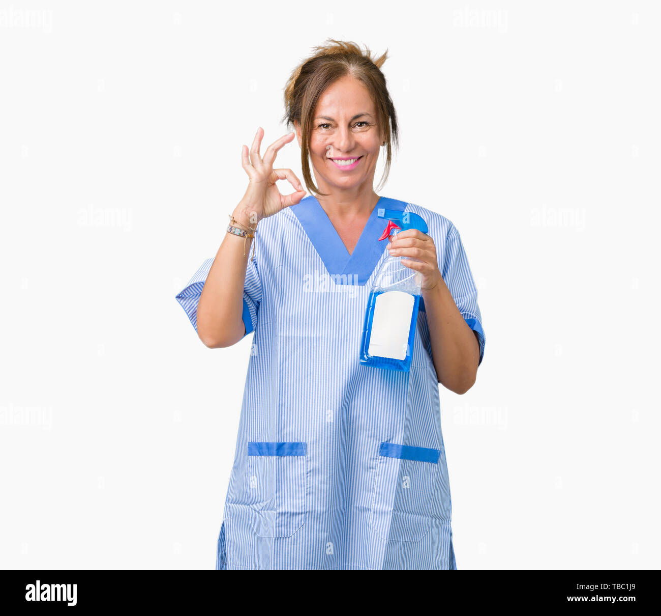 Middle age brunette cleaner woman wearing housework uniform over ...