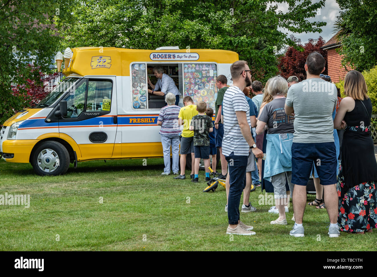 Queue for ice cream van Stock Photo - Alamy