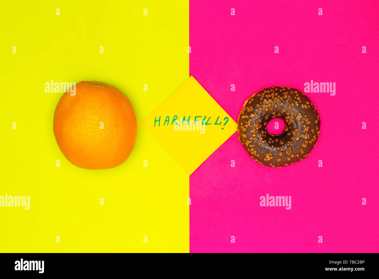 Healthy food vs harmful snacks. Choice concept. Orange and donut. Trend ...