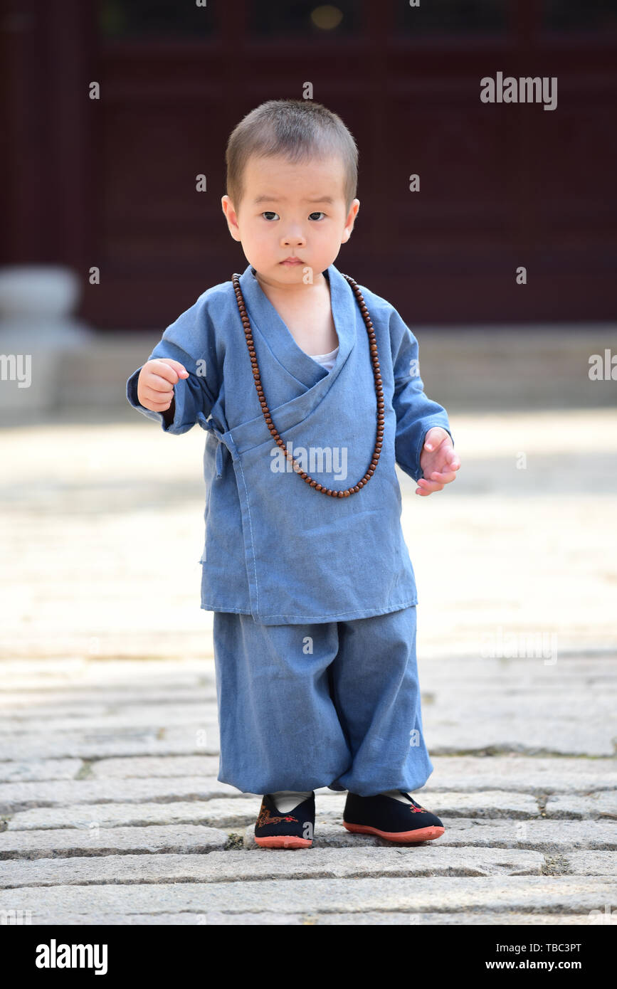 Cute little monk Stock Photo - Alamy