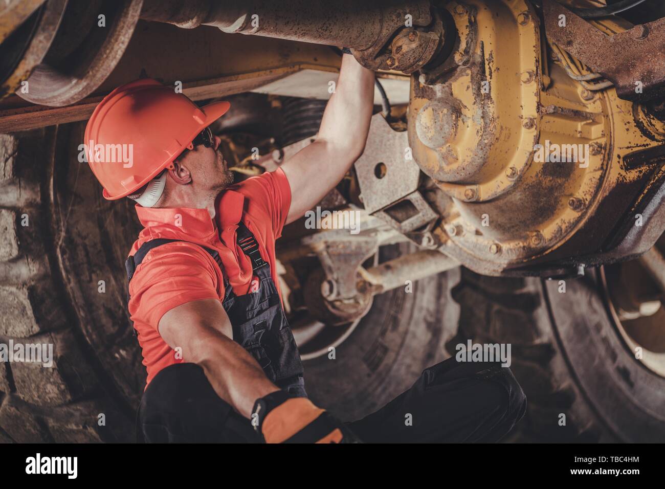 Heavy Duty Mining Dump Truck Differential Problem. Caucasian Driver ...