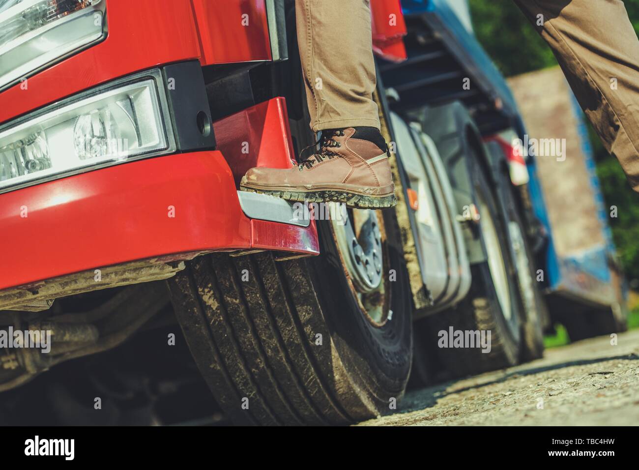 Truck Driver and His Job Conceptual Photo of Men Getting Into Semi ...