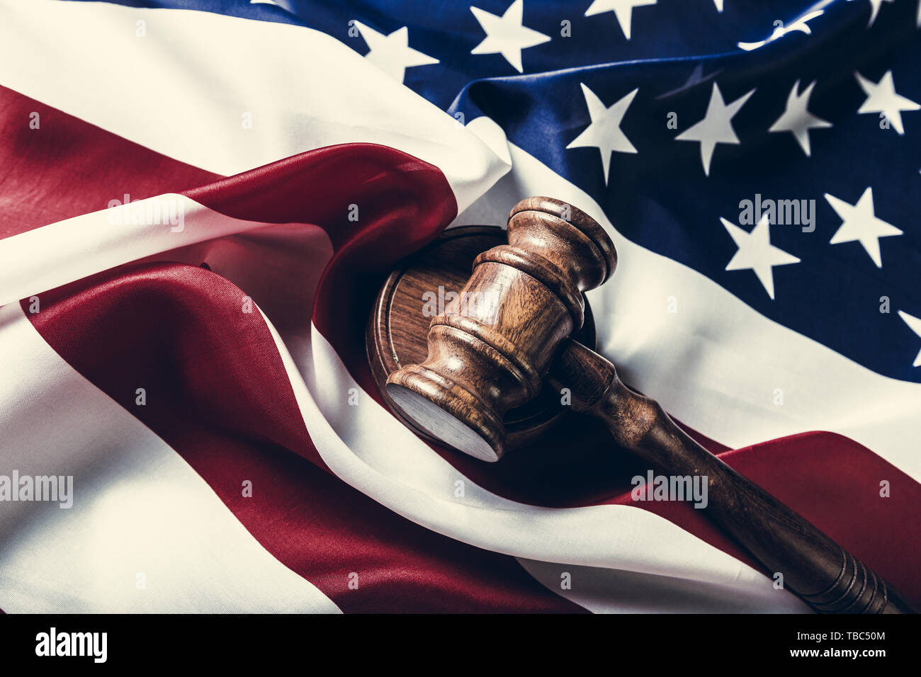Wooden gavel and USA flag Stock Photo - Alamy