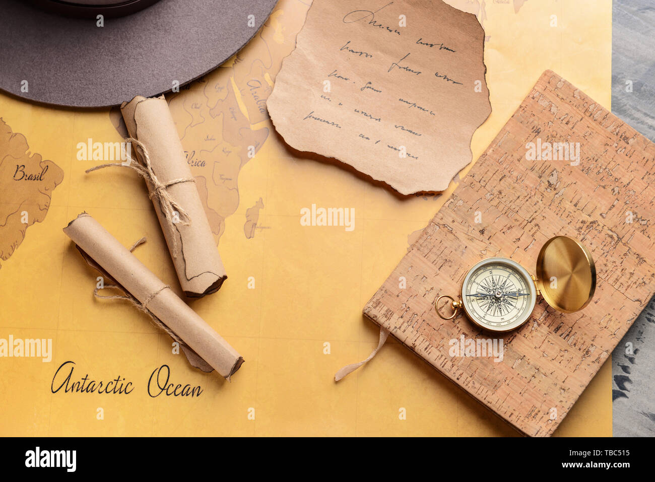 Compass with letters on map Stock Photo - Alamy