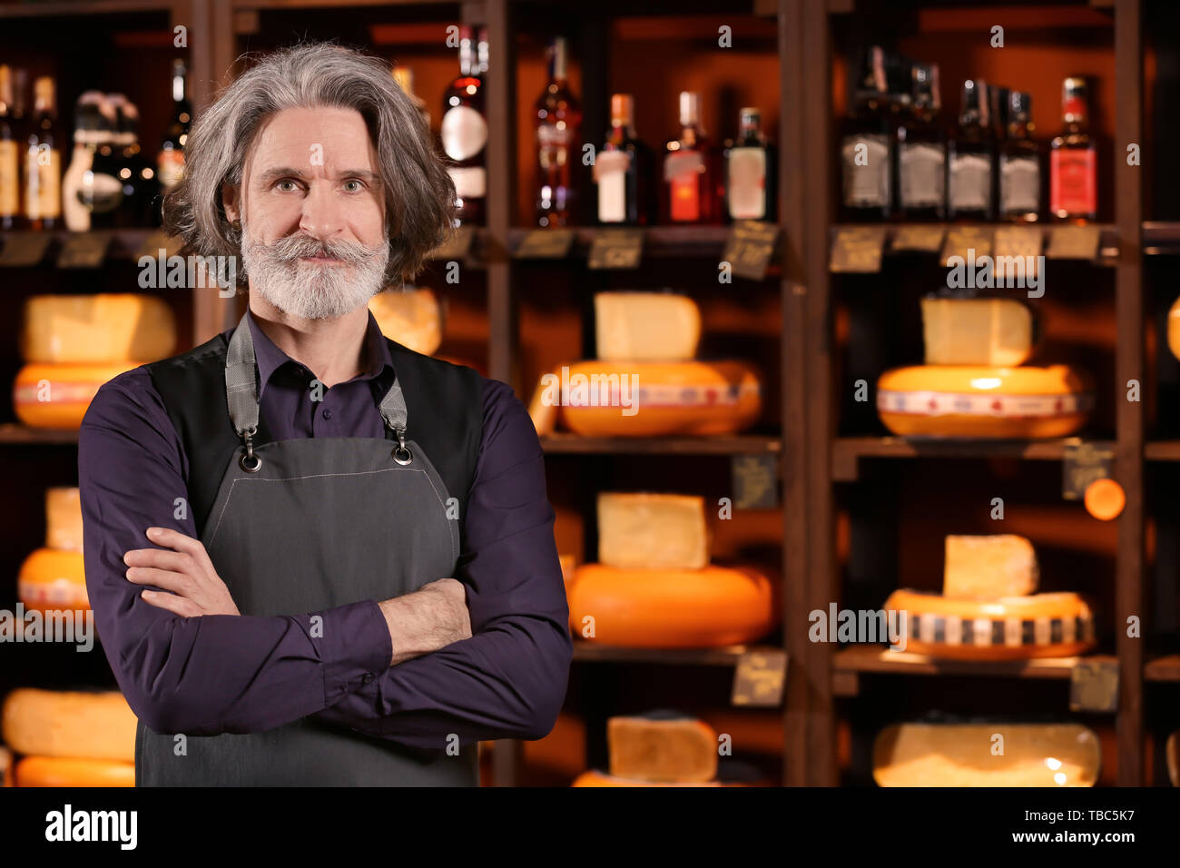 Business owner in his store Stock Photo - Alamy