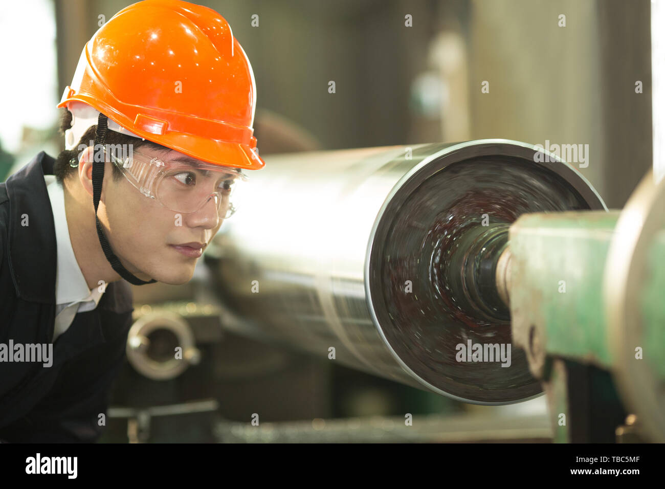 Chinese male worker at manufacturing hi-res stock photography and ...