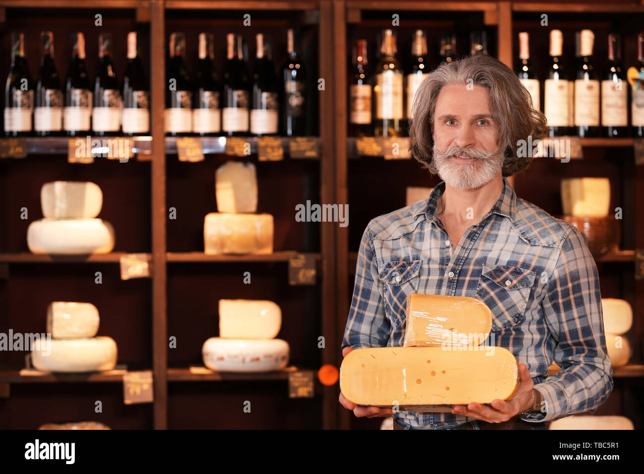 Male salesman in cheese hi-res stock photography and images - Alamy