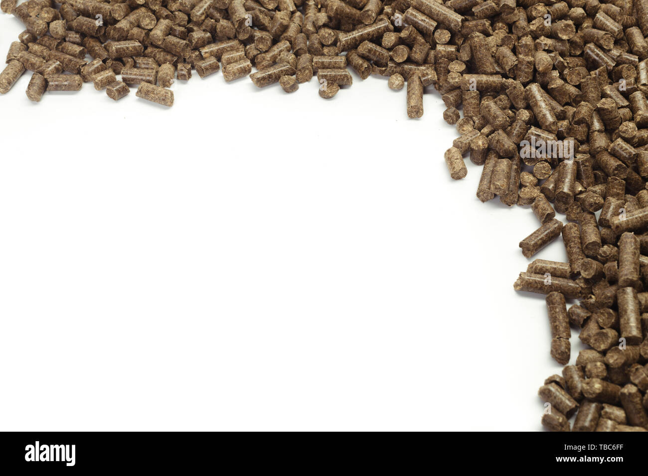 stack of wooden pellets for bio energy, white background, isolated ...