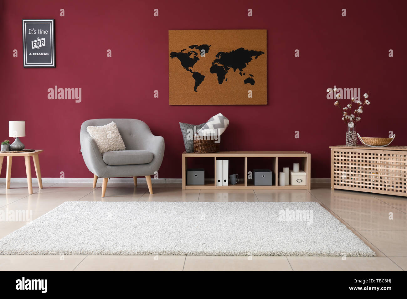 Interior of living room with picture of map on wall Stock Photo - Alamy