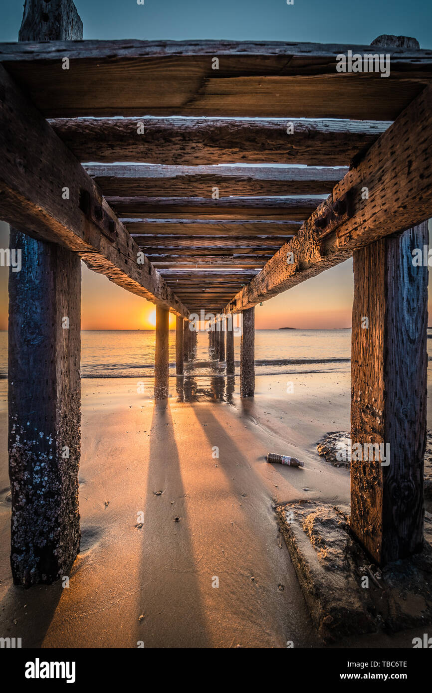 No one's in the waters. Tourists, abandoned buildings, beach, wooden ...