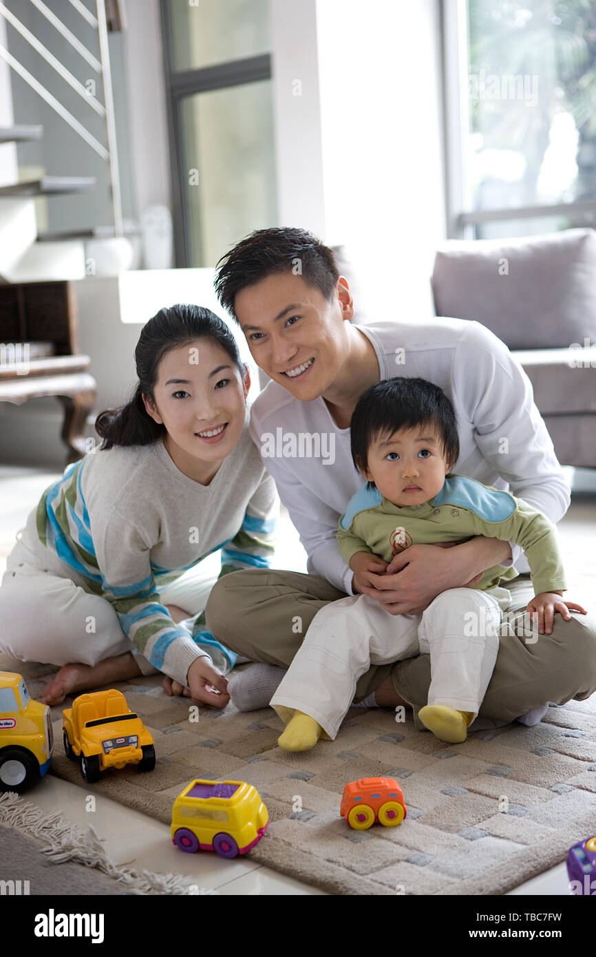 Parents and children play games Stock Photo - Alamy