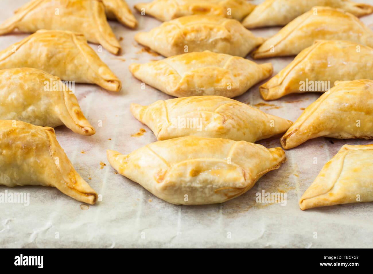 traditional hindu pastry baked filled with vegetables Stock Photo - Alamy