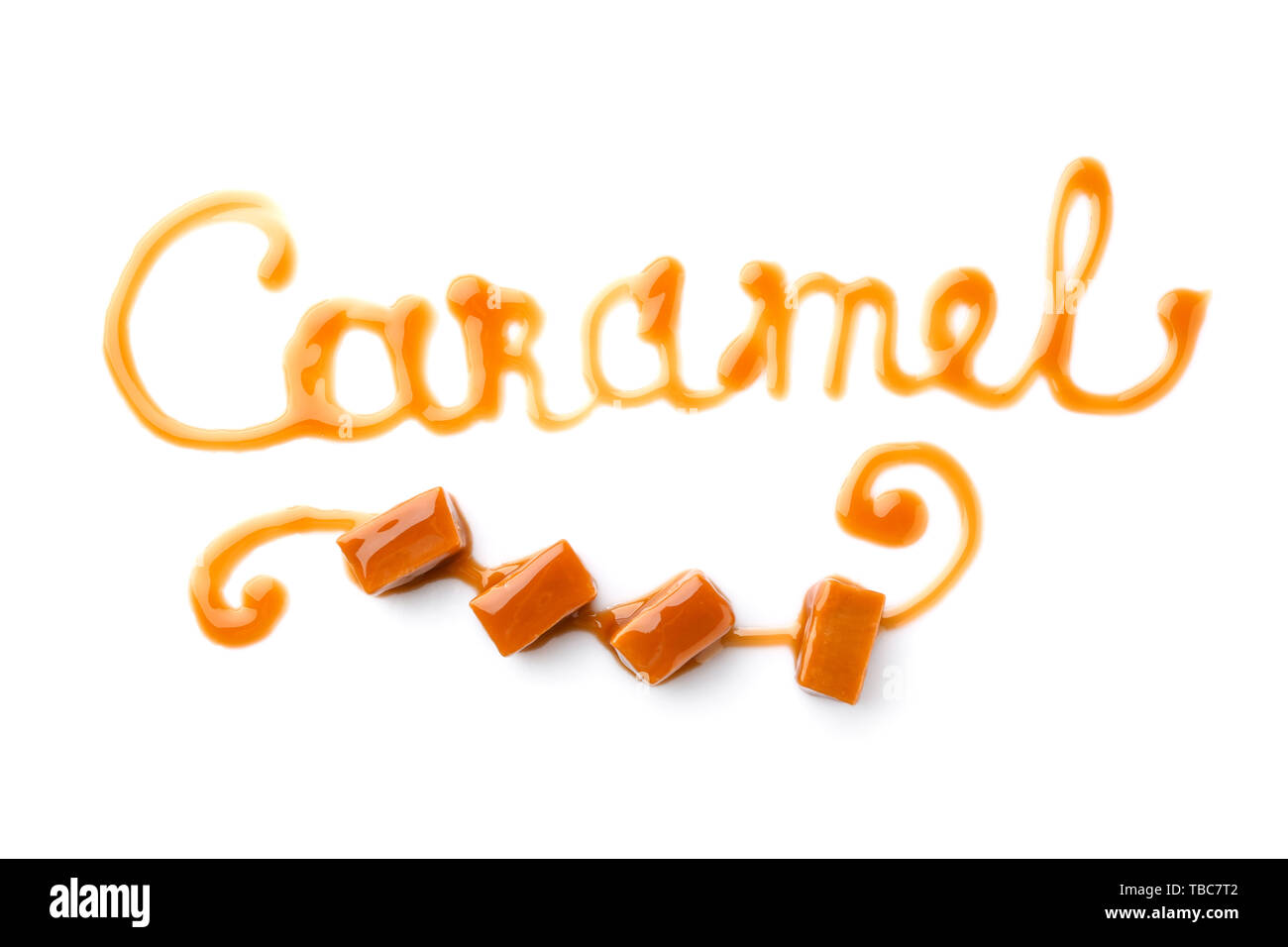Composition with word CARAMEL on white background Stock Photo - Alamy