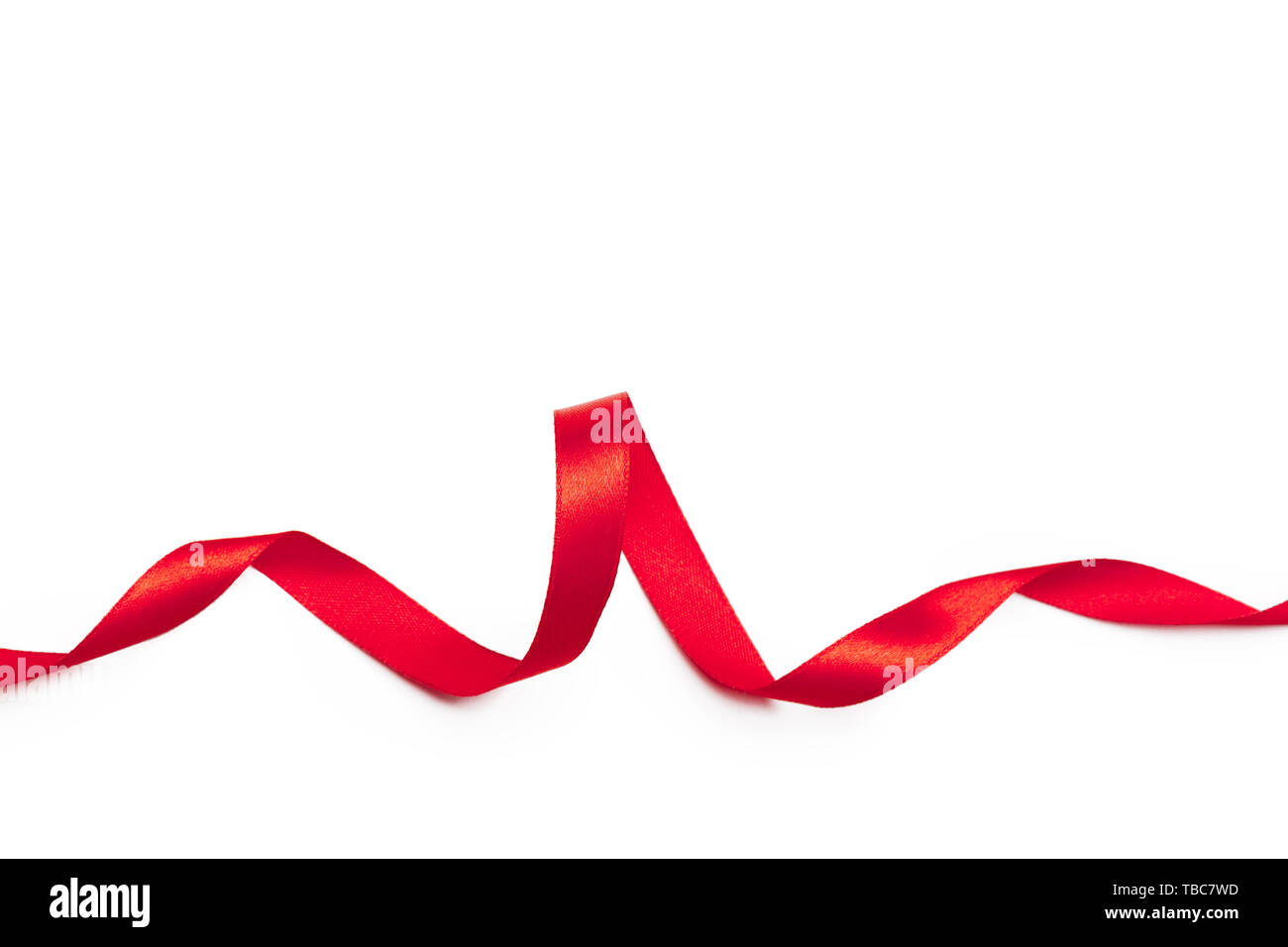 Red ribbon on white background Stock Photo - Alamy