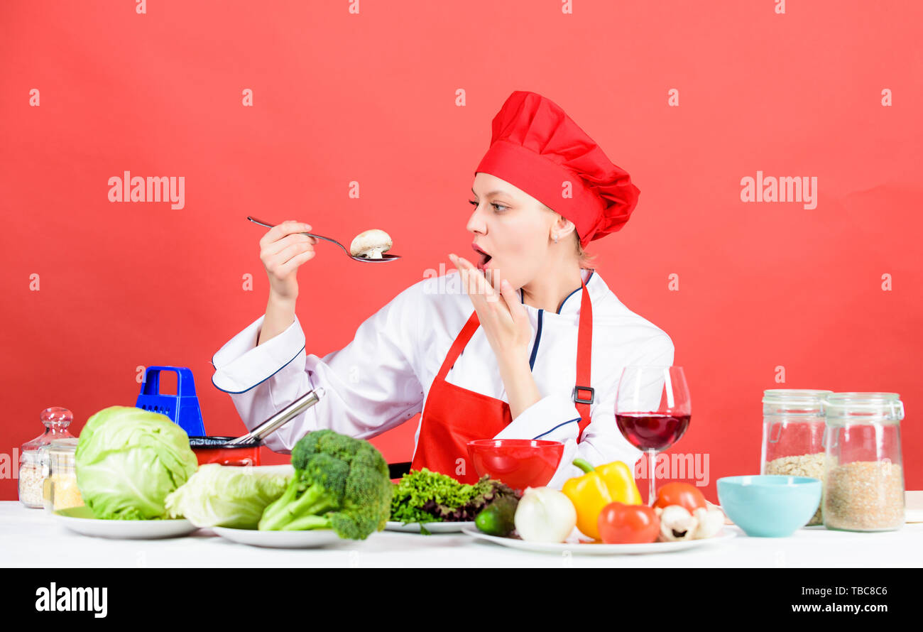 Girl at kitchen table. Cooking food and housekeeping. Housewife routine ...