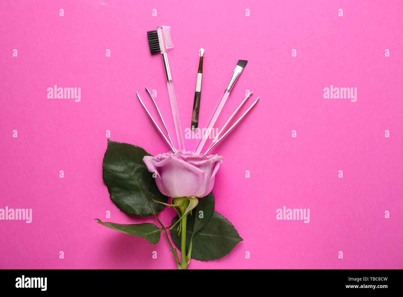 Flower and set of tools for eyebrows correction on color background ...
