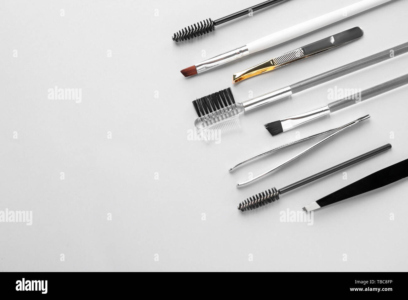 Set of tools for eyebrows correction on white background Stock Photo ...