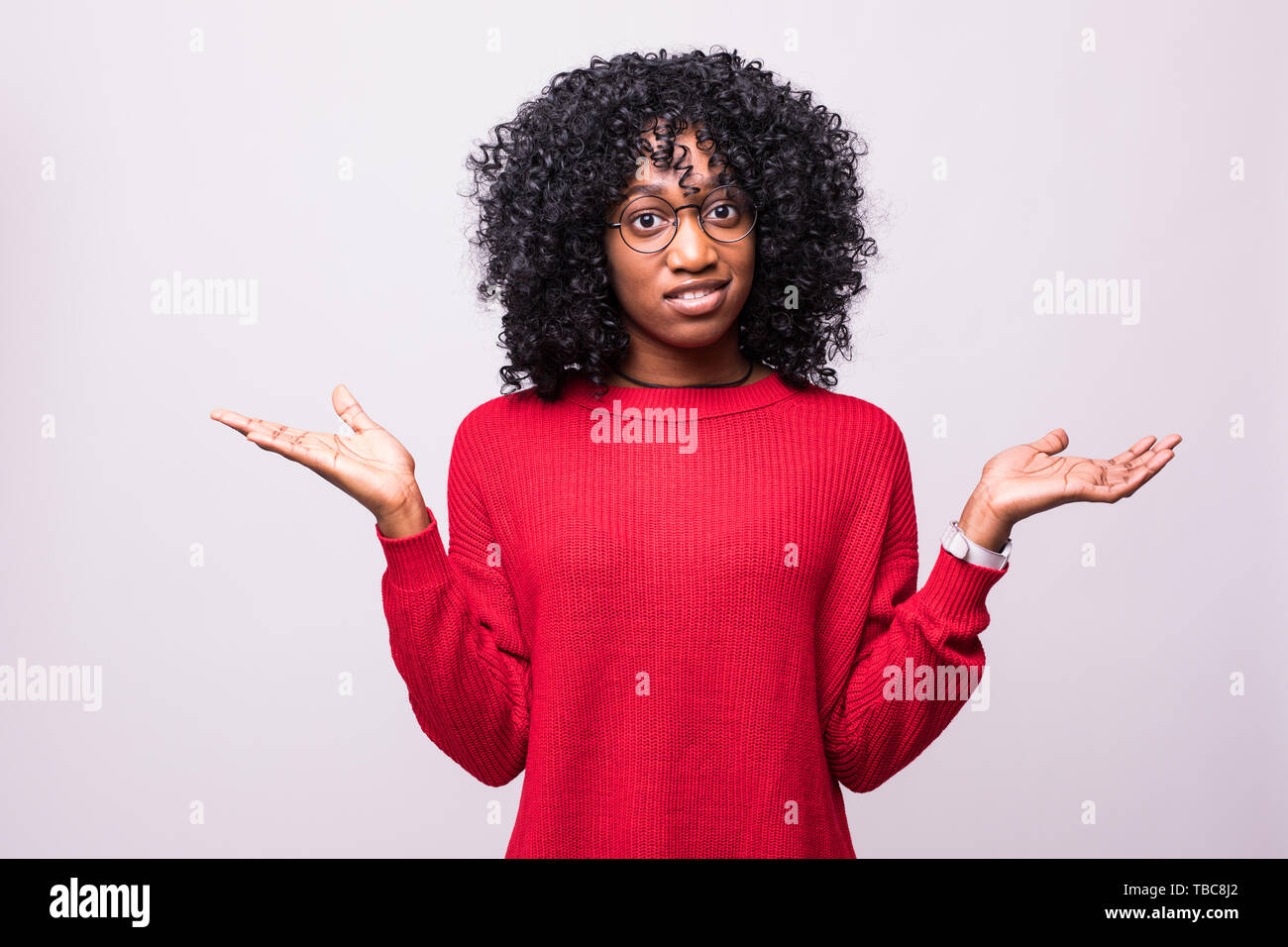 Desperate young woman asking for help from above on white background ...