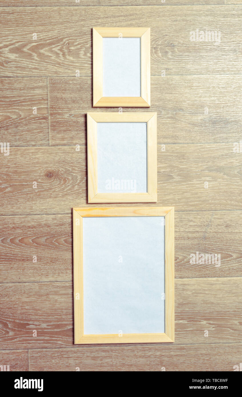 photo frames on the wooden wall Stock Photo - Alamy