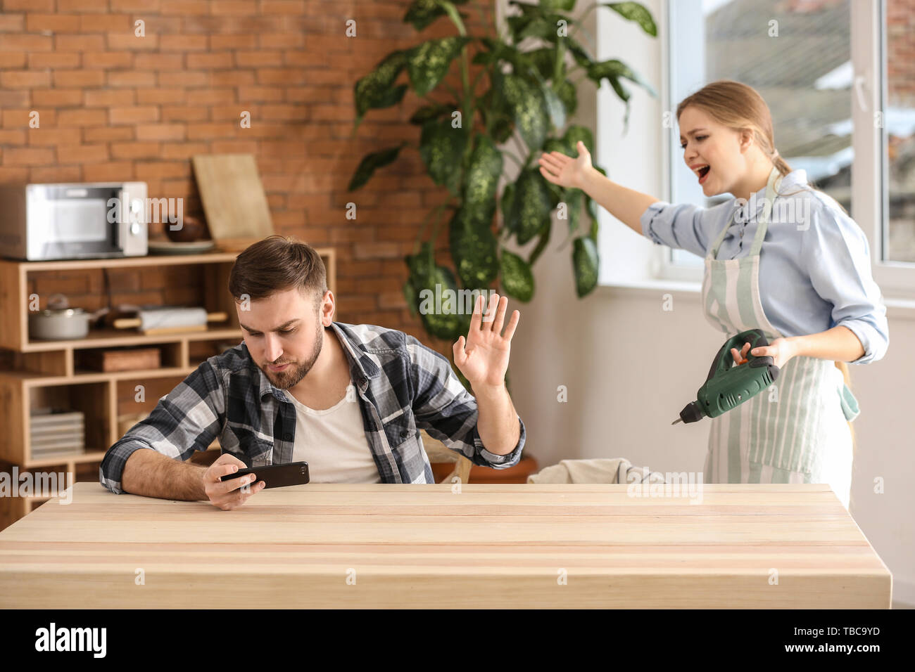 Woman Scolding Husband High Resolution Stock Photography and Images - Alamy