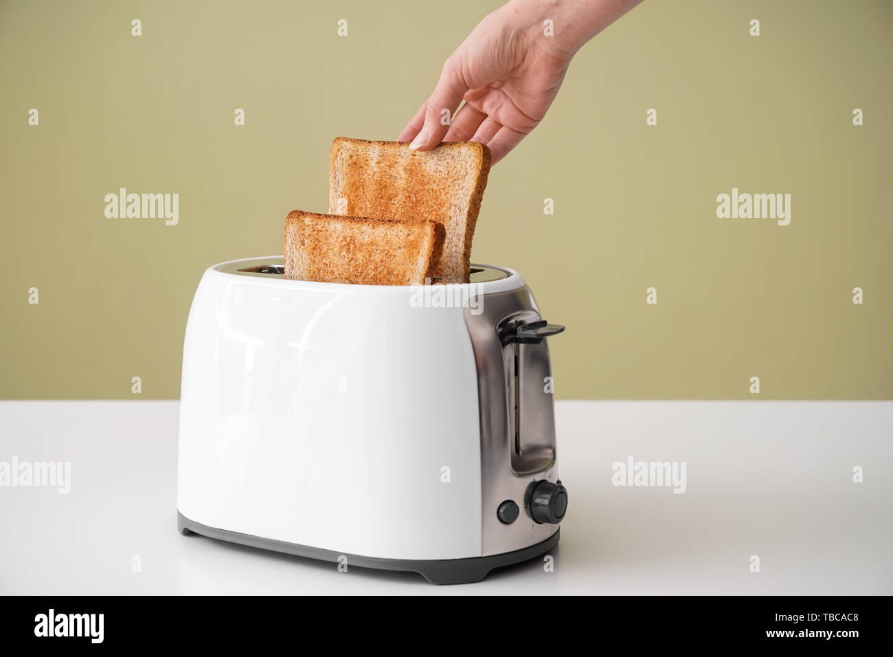 Taking bread hi-res stock photography and images - Alamy