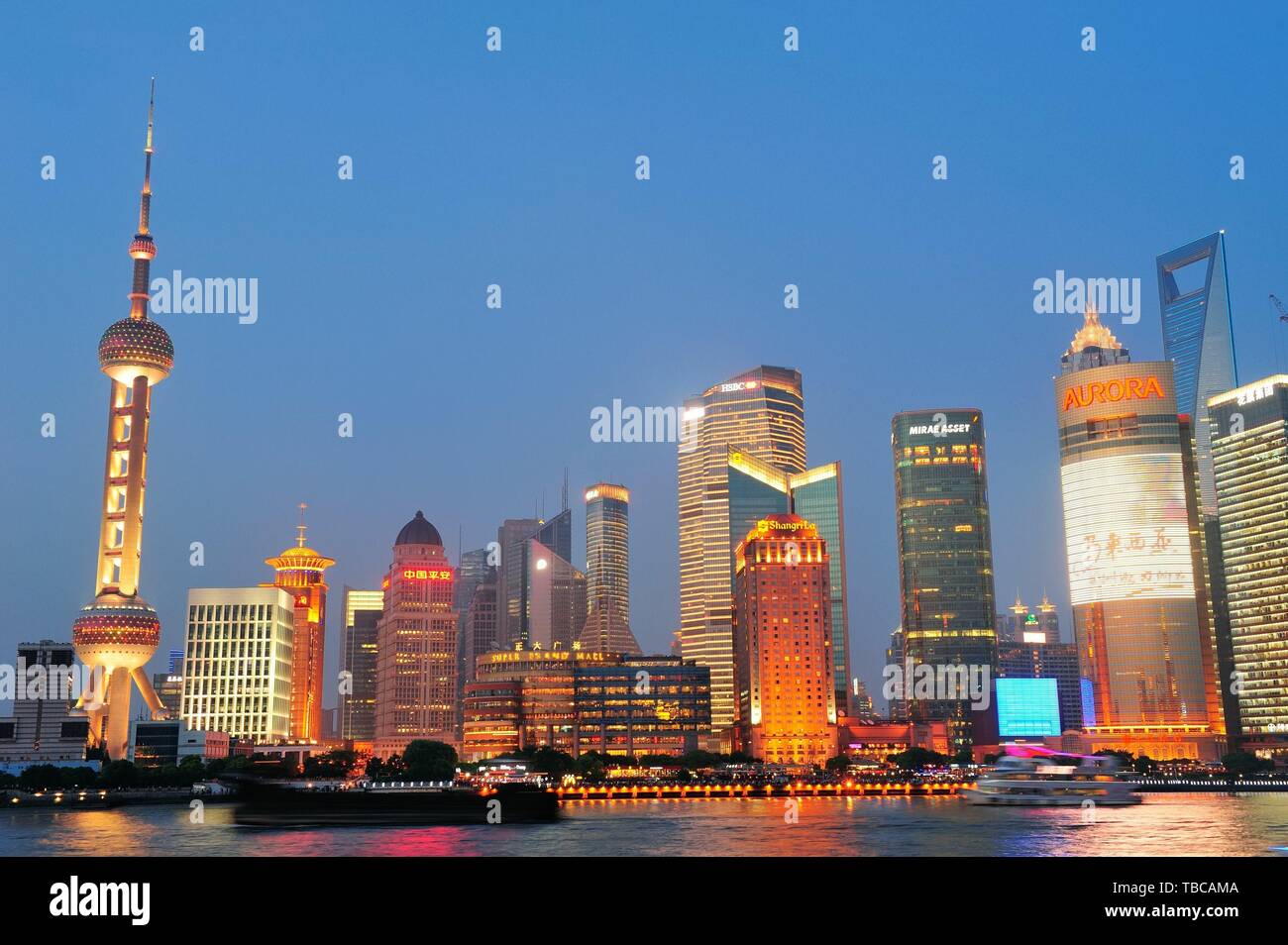 SHANGHAI, CHINA - JUNE 2: Crowded urban skyscrapers at dusk on June 2 ...