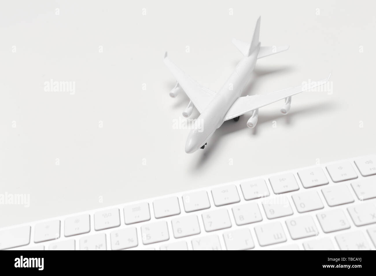 Aircraft and laptop keyboard Stock Photo - Alamy