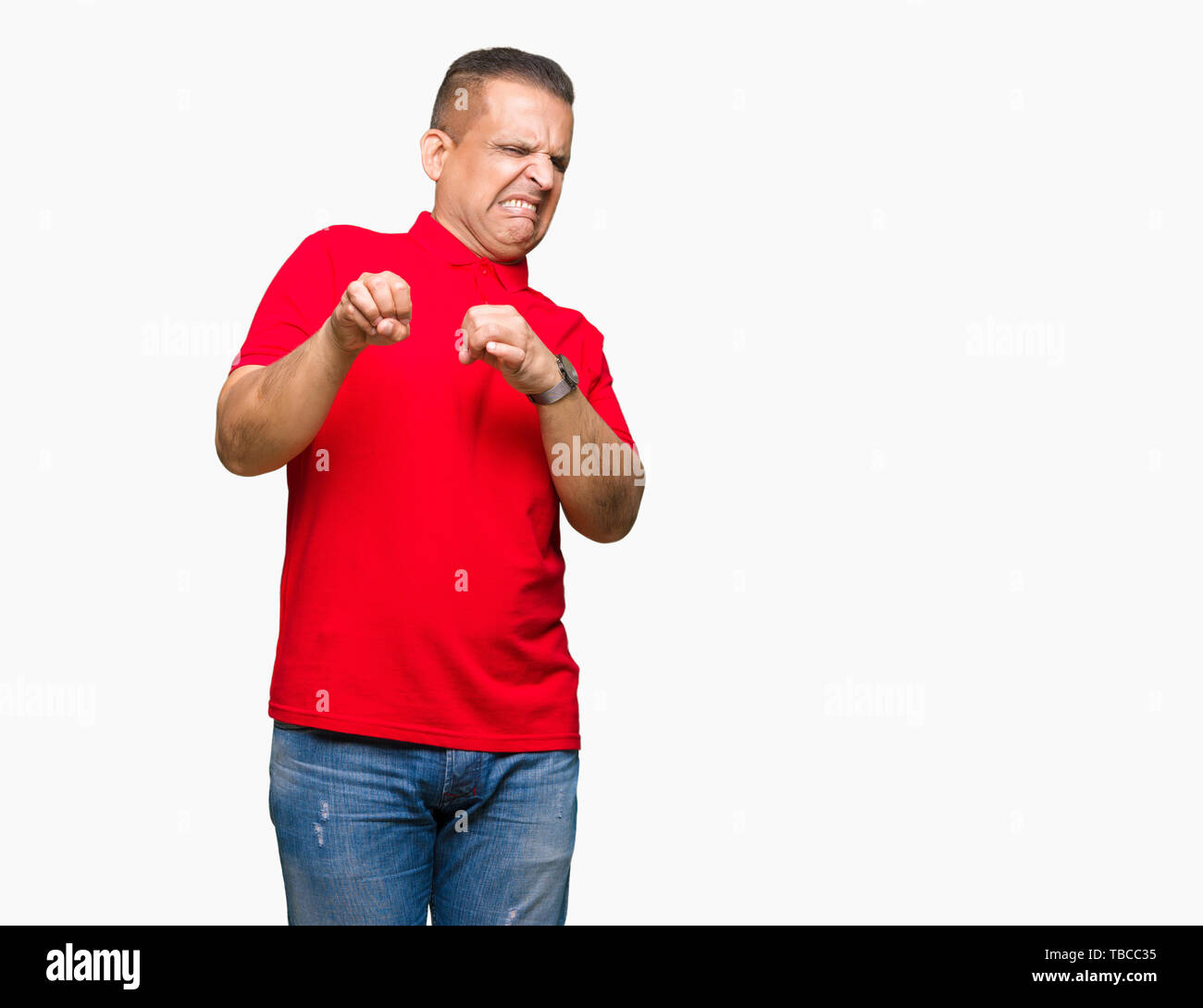 Middle age arab man over isolated background disgusted expression ...